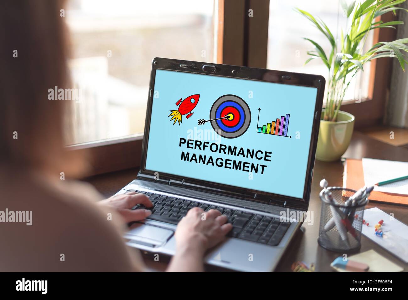 Laptop screen displaying a performance management concept Stock Photo ...