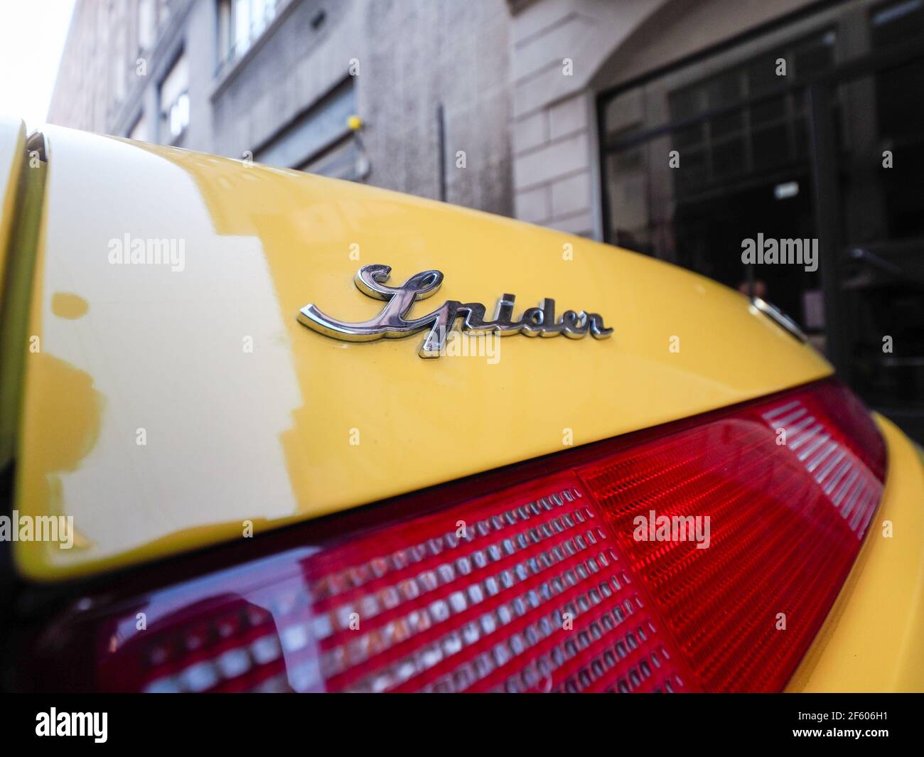 yellow Alfa Romeo Spider GTV cabriolet roadster Stock Photo - Alamy