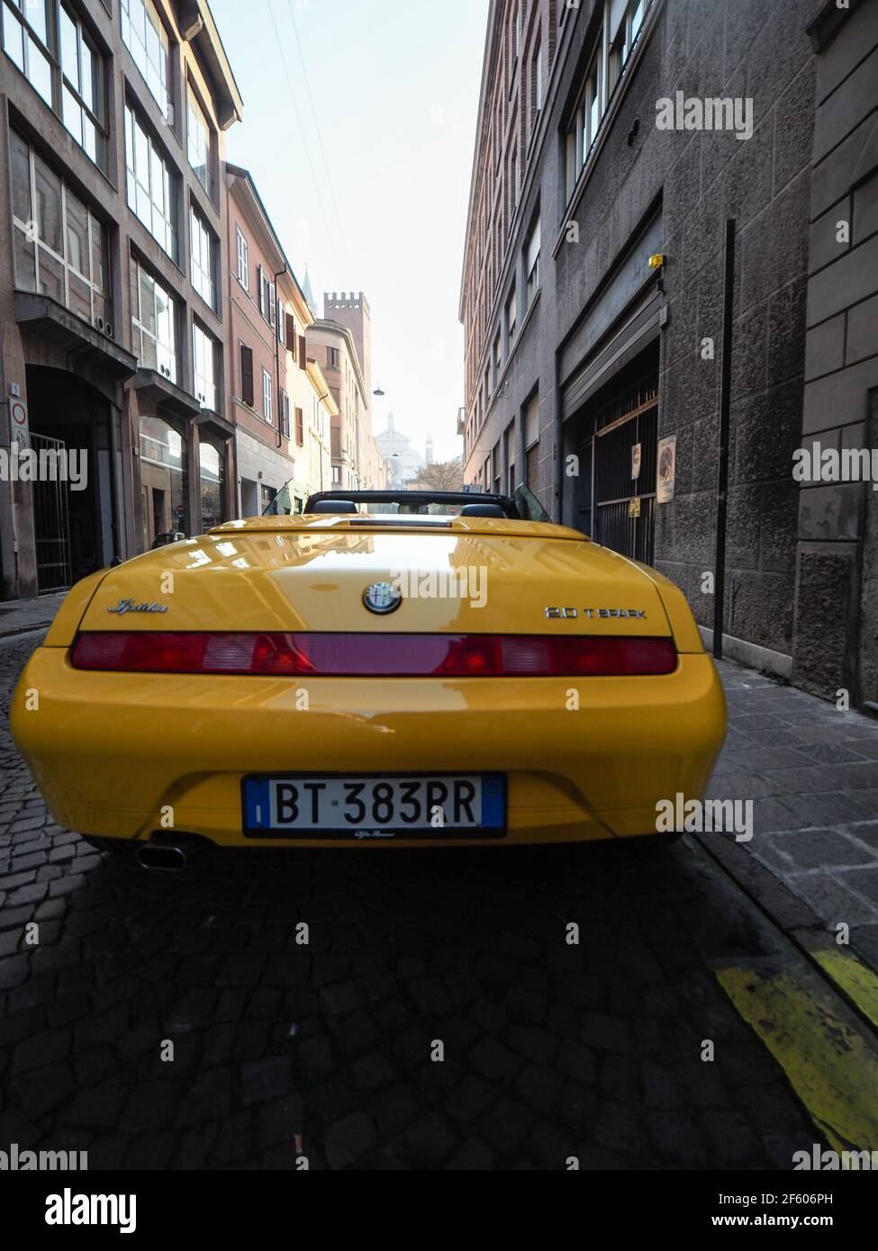 yellow Alfa Romeo Spider GTV cabriolet roadster Stock Photo - Alamy