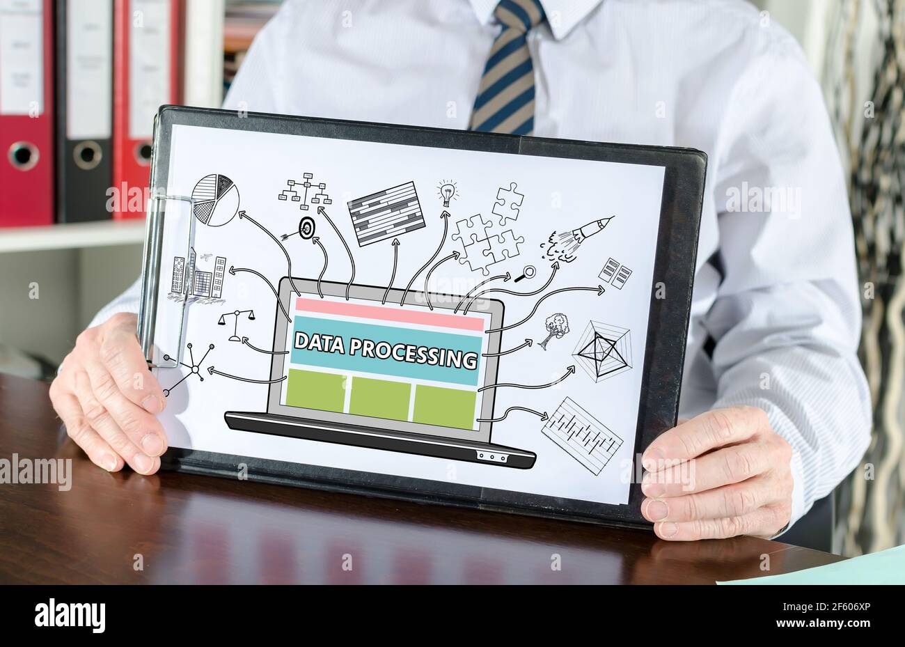 Data processing concept shown by a businessman Stock Photo - Alamy