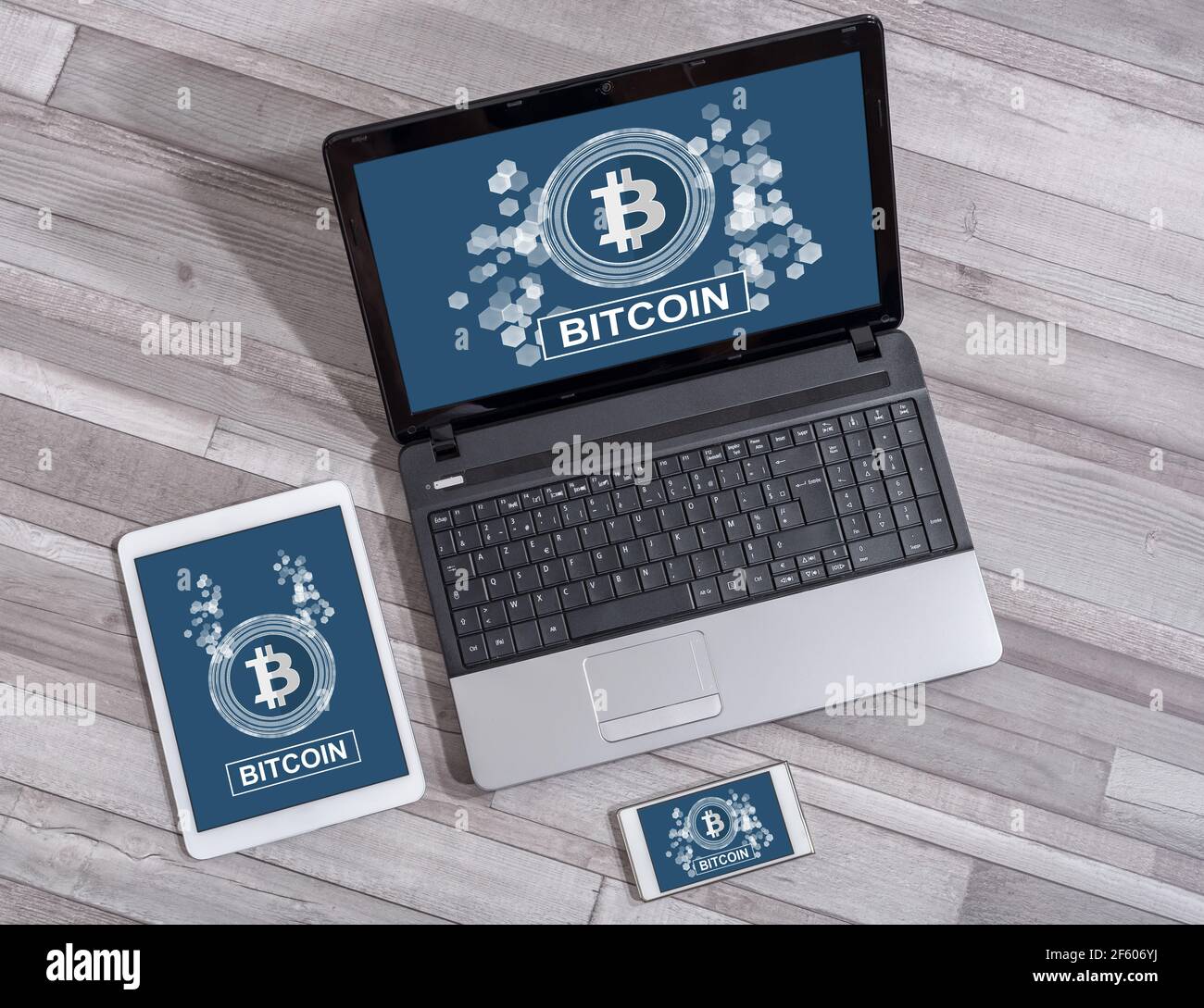 Bitcoin concept shown on different information technology devices Stock ...