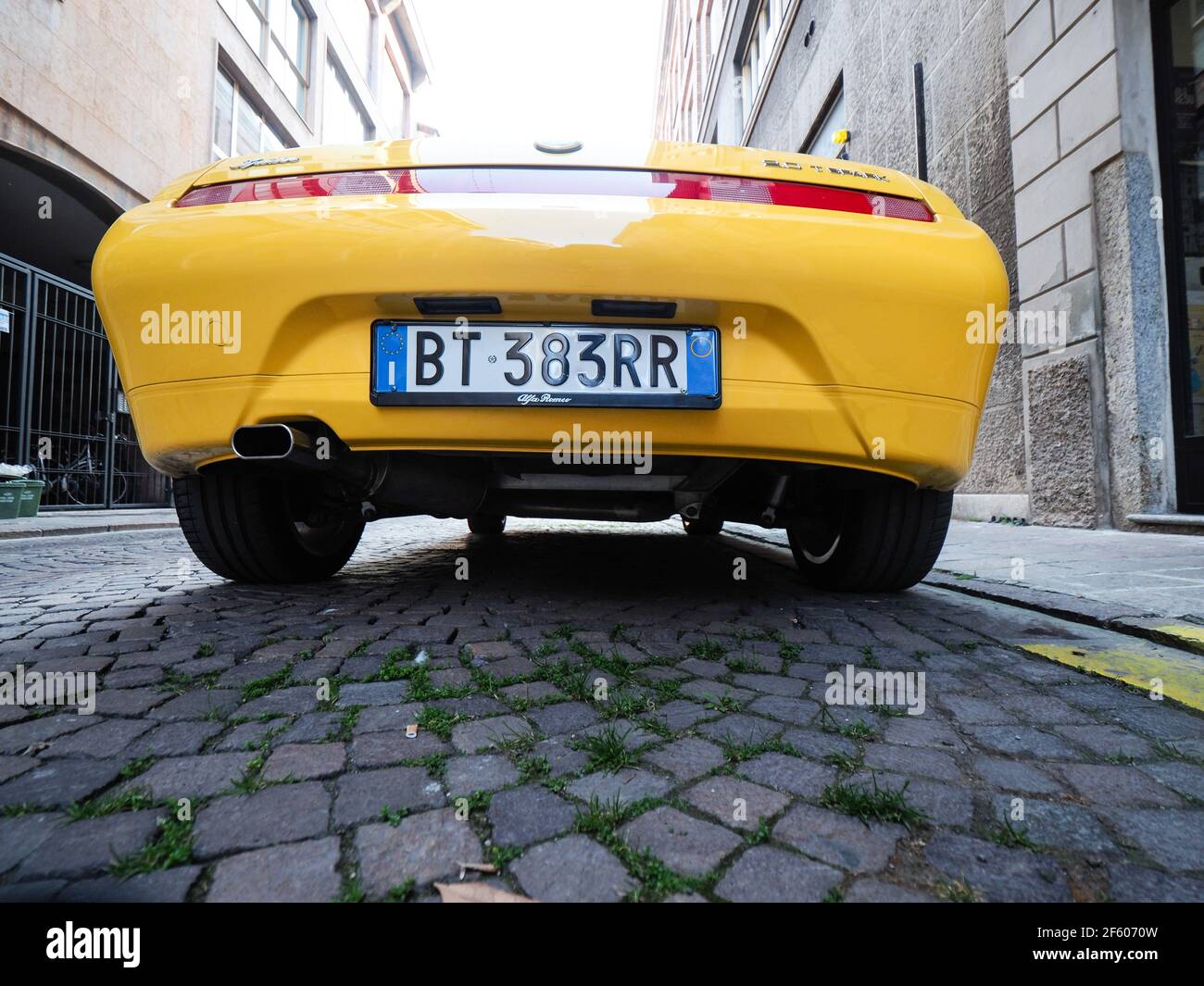 yellow Alfa Romeo Spider GTV cabriolet roadster Stock Photo - Alamy