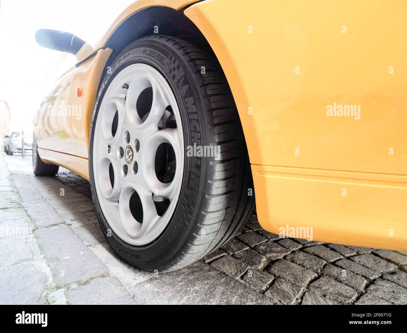 yellow Alfa Romeo Spider GTV cabriolet roadster Stock Photo - Alamy