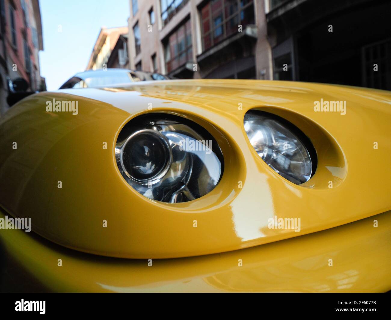 yellow Alfa Romeo Spider GTV cabriolet roadster Stock Photo - Alamy