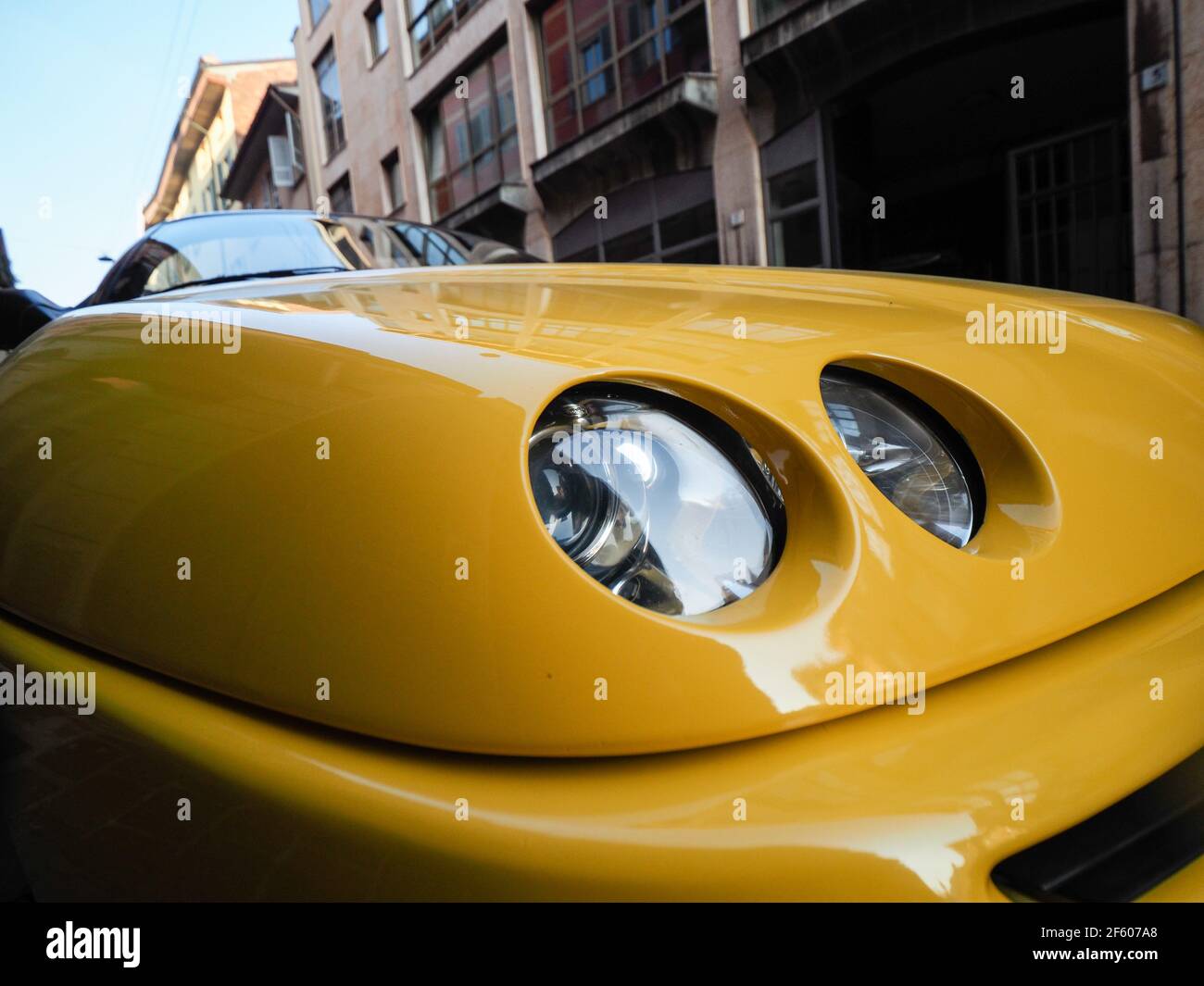yellow Alfa Romeo Spider GTV cabriolet roadster Stock Photo - Alamy