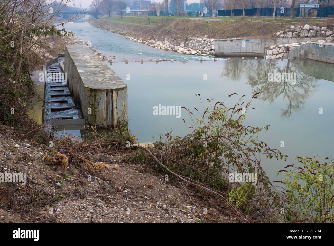 Dam view from Above: Small Rock Dam of a River in a Built-up Area Stock ...