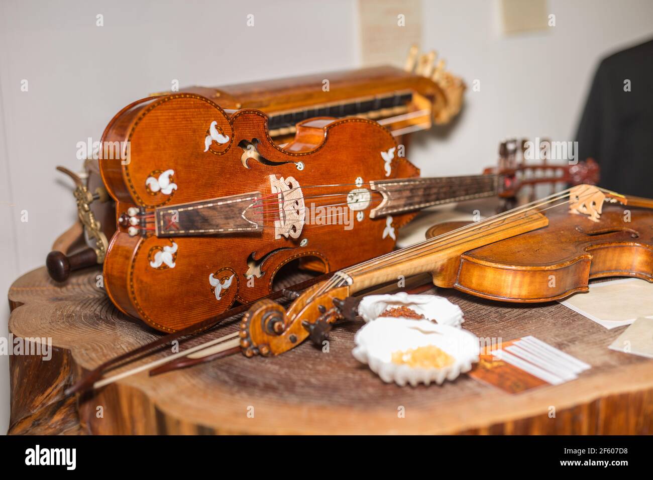 Baroque Wooden Violin on a Tree Trunk near other Instruments Stock ...