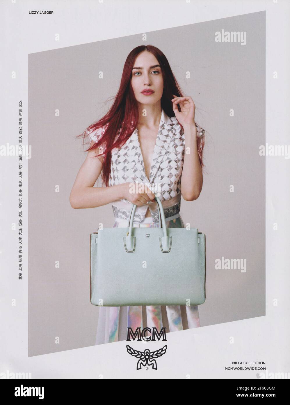 poster advertising MCM fashion house with Lizzy Jagger in magazine from ...