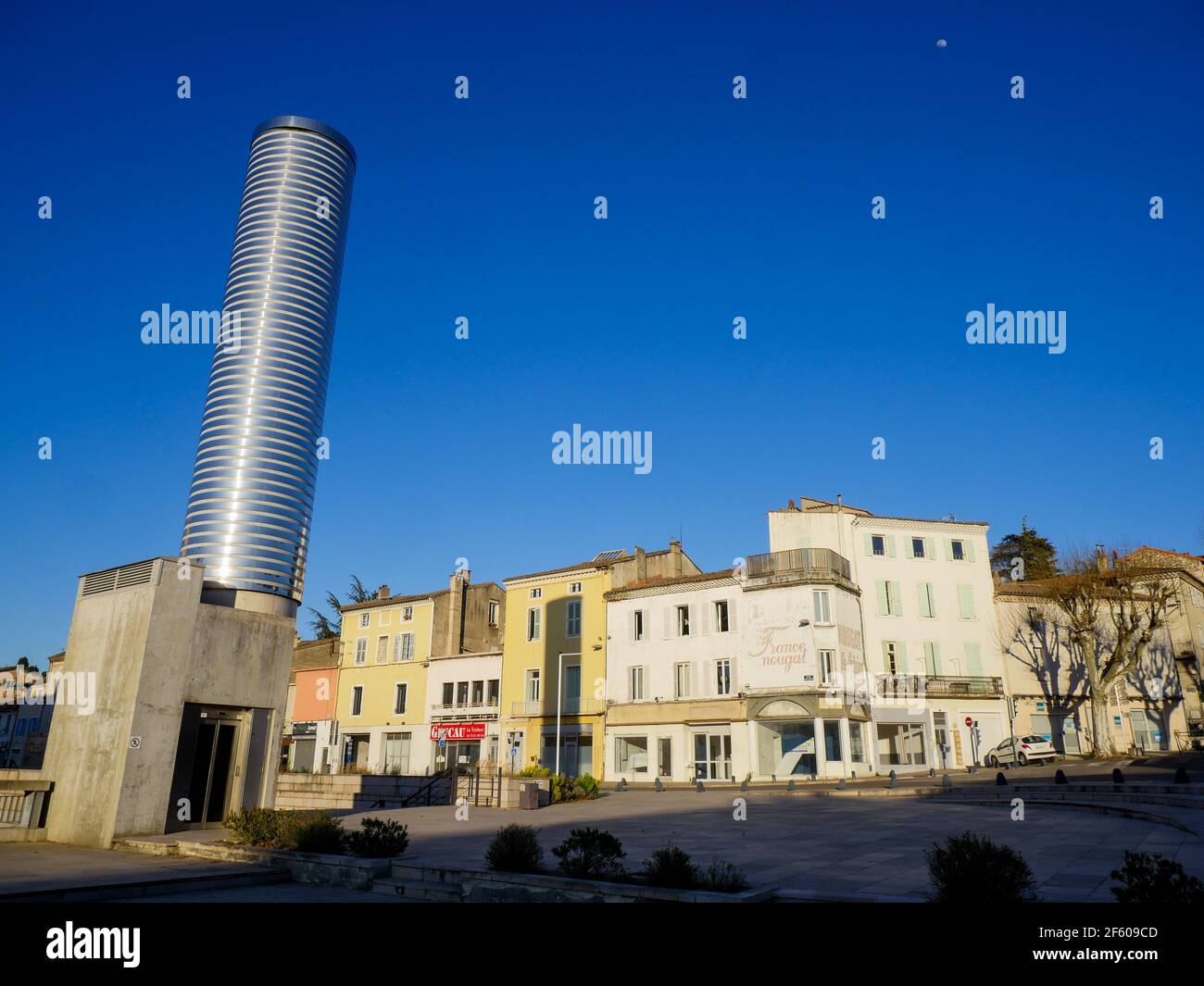 Sign of Saint-Mart' restaurant with at second range, old buildings ...