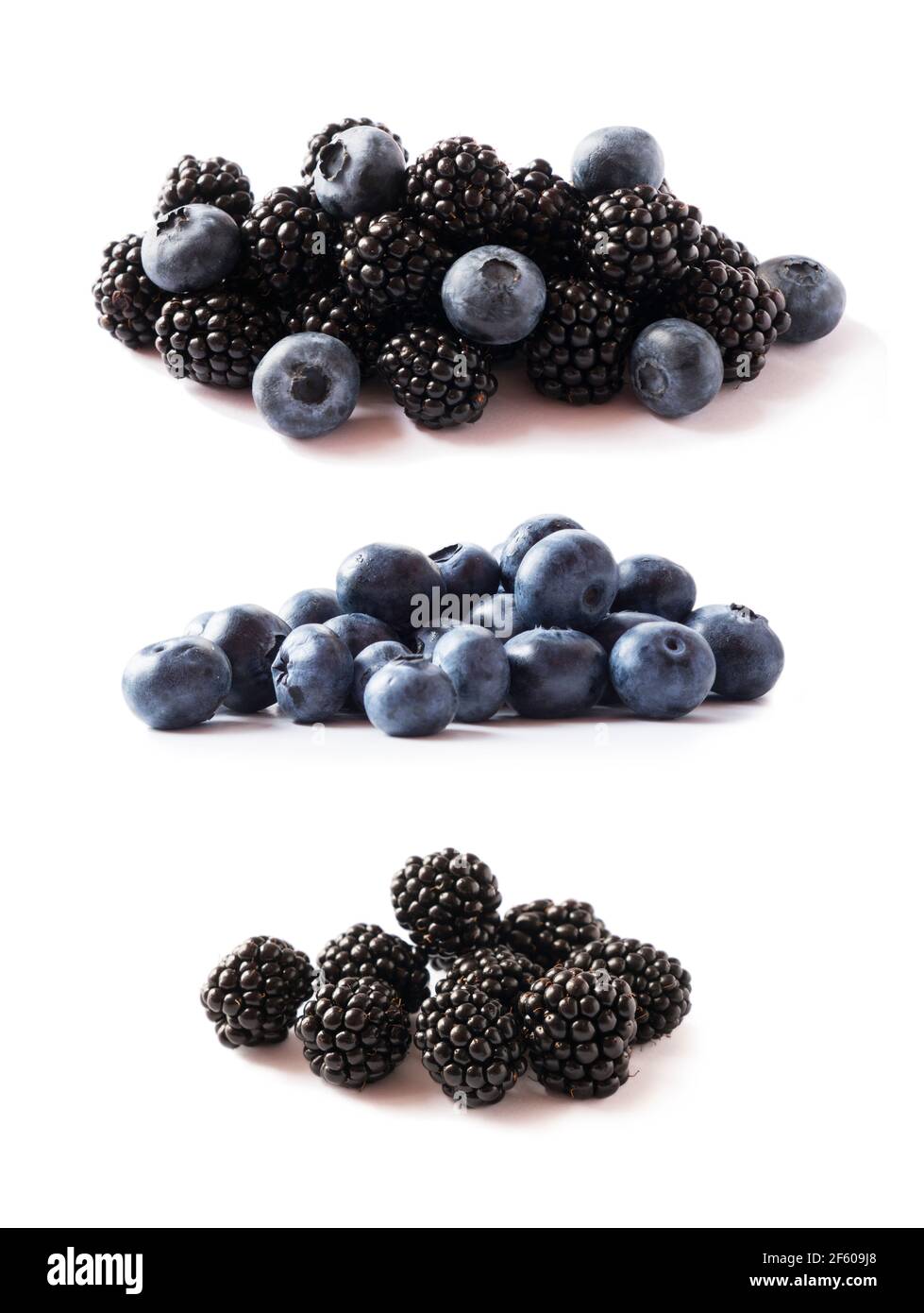 Black and blue berries isolated on a white. Top view. Ripe blackberries ...