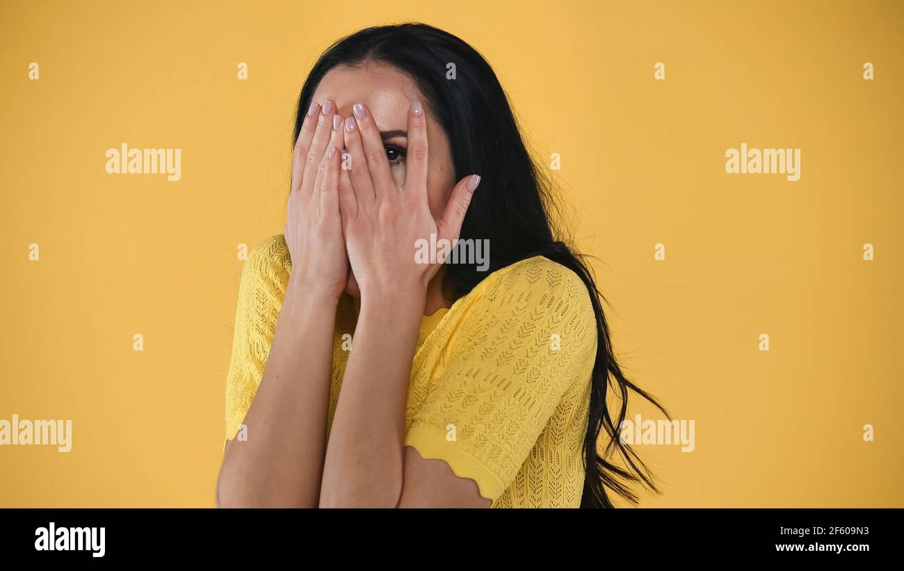 Woman hands on face scared hi-res stock photography and images - Alamy
