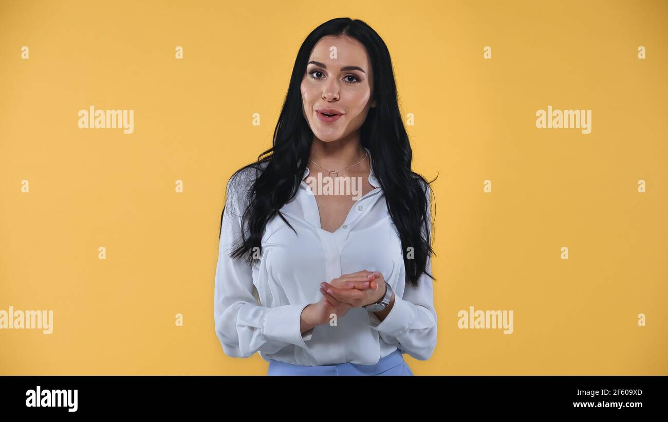 Attractive young woman clapping hands hi-res stock photography and ...