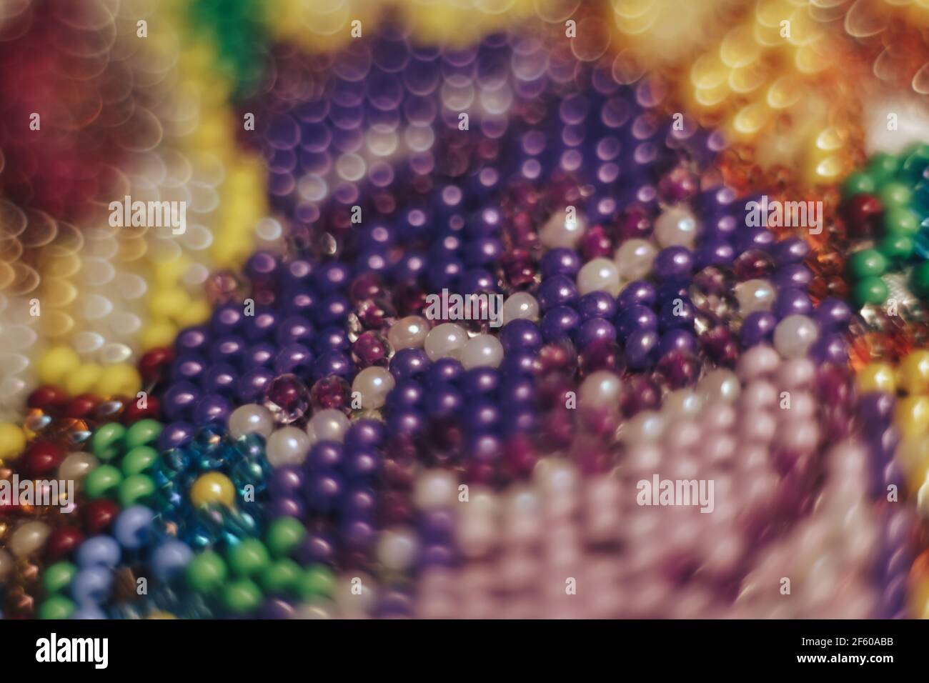 Multi colored glass beads on a white background texture pattern for ...