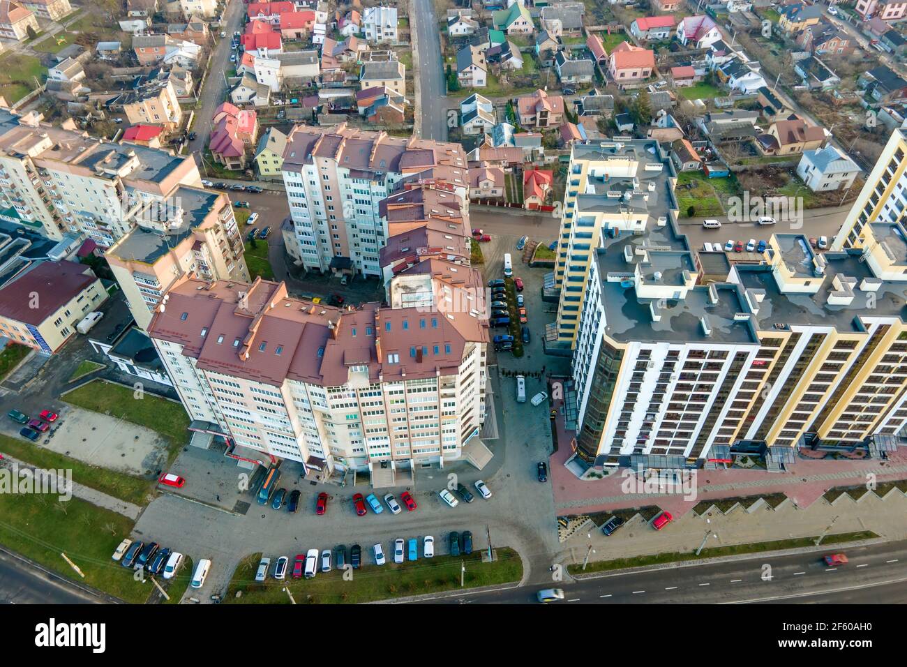 High rise apartment buildings and streets with traffic in city ...