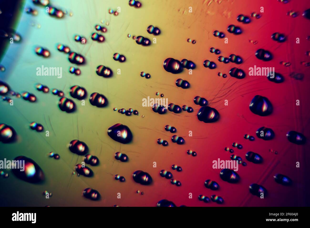 Beautiful abstraction multi colored water drop. Background pattern for ...
