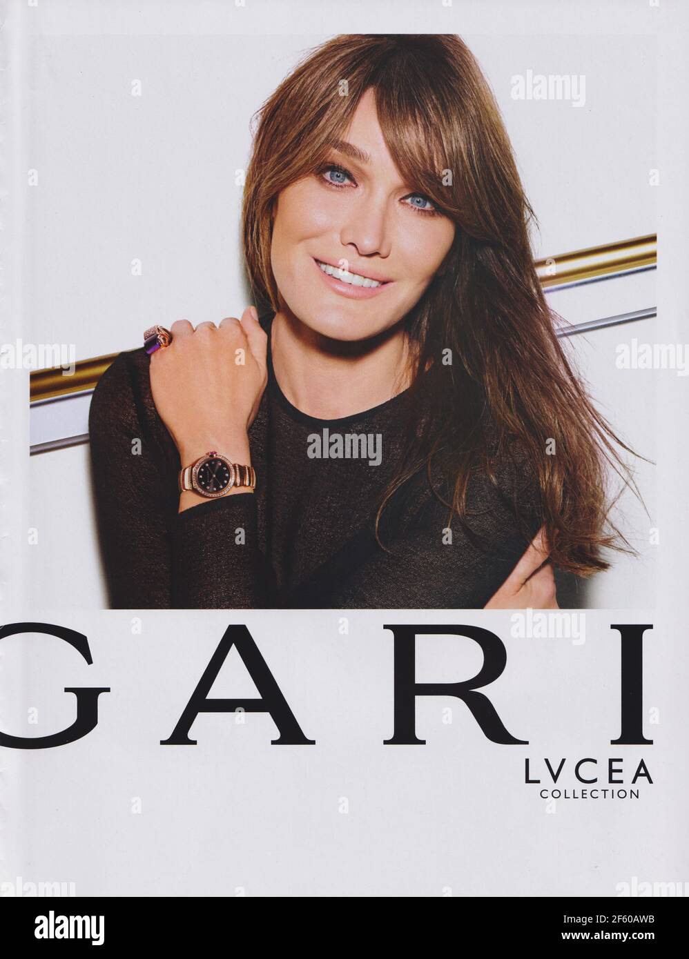 poster advertising BVLGARI fashion house with Carla Bruni in paper ...