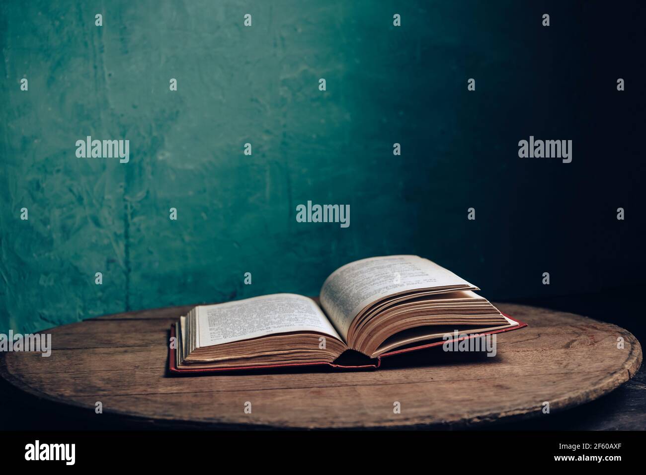 Open vintage ancient book. Pattern background for design. The book on a ...