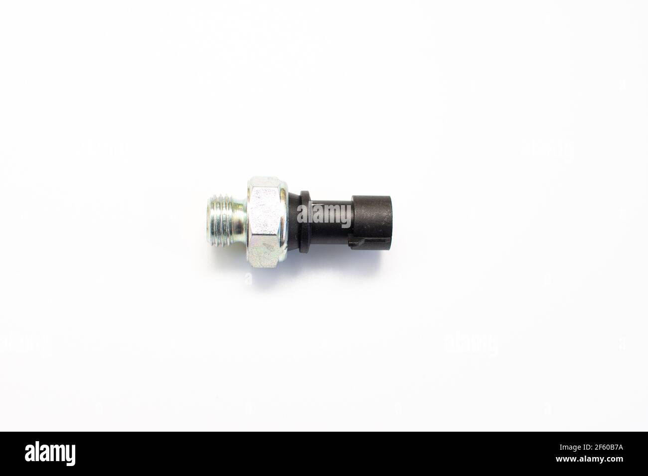 Car oil pressure sensor isolated. on white background Stock Photo - Alamy