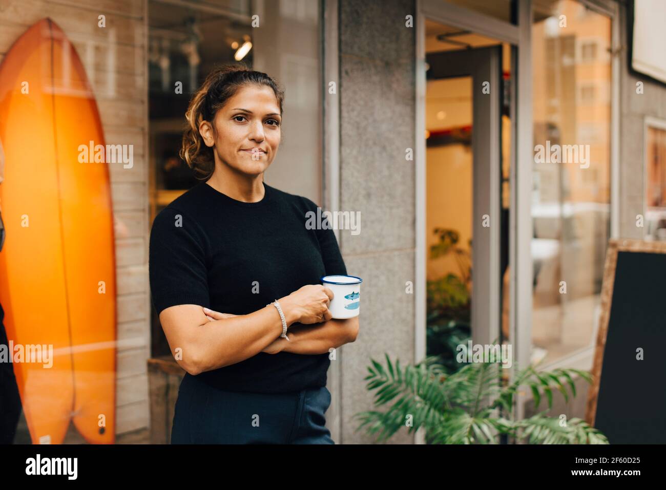 Owner standing outside coffee shop hi-res stock photography and images ...