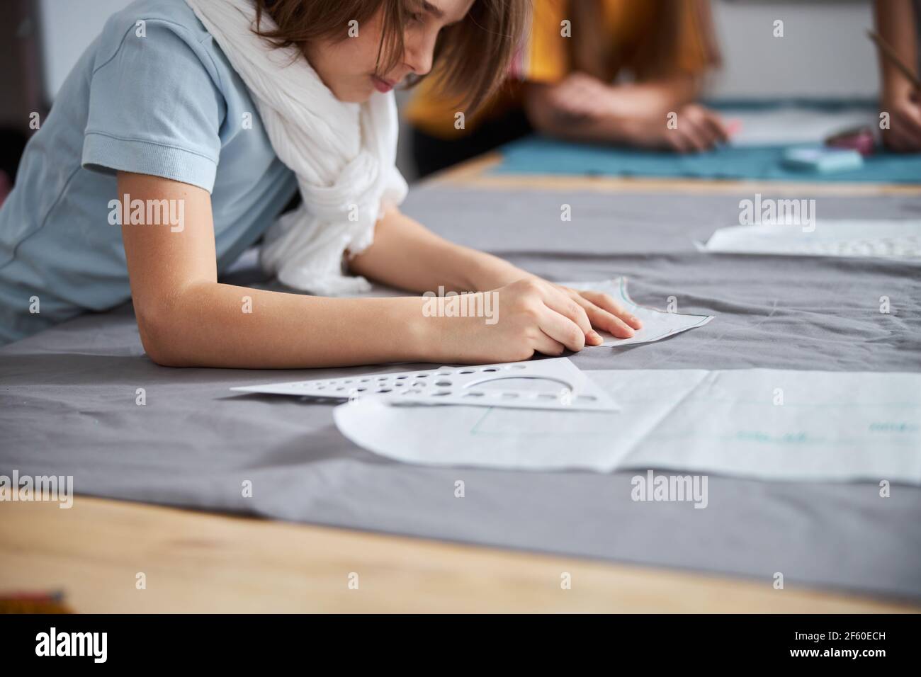 Adorable girl preparing fabric hi-res stock photography and images - Alamy