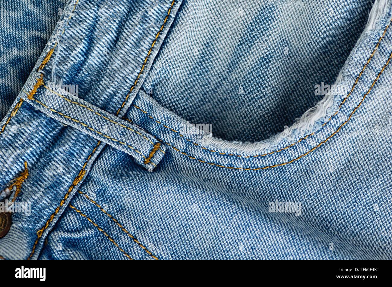 Denim jeans texture background. The texture of the cotton fabric. Close ...