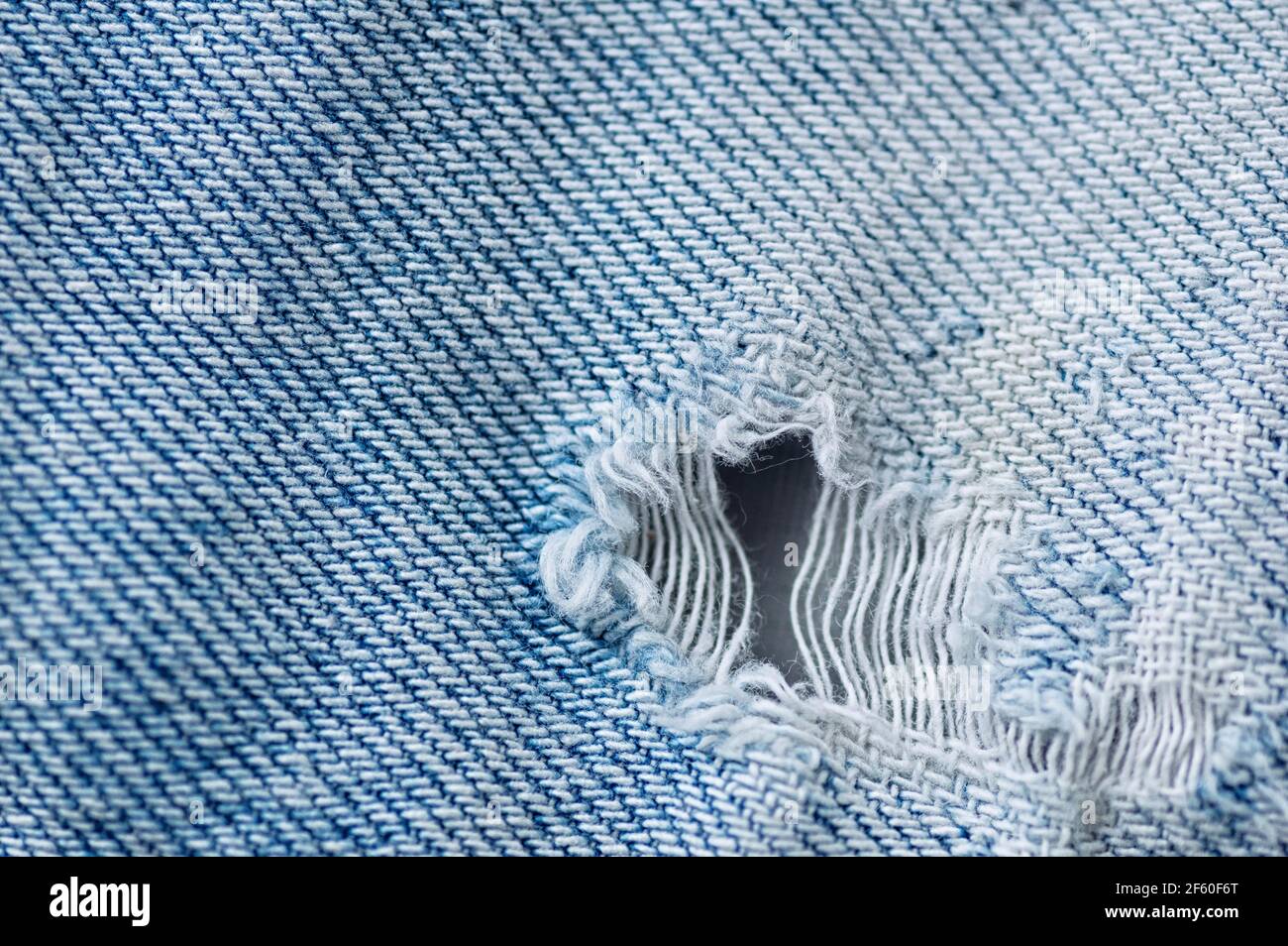 Denim jeans texture background. The texture of the cotton fabric. Close ...