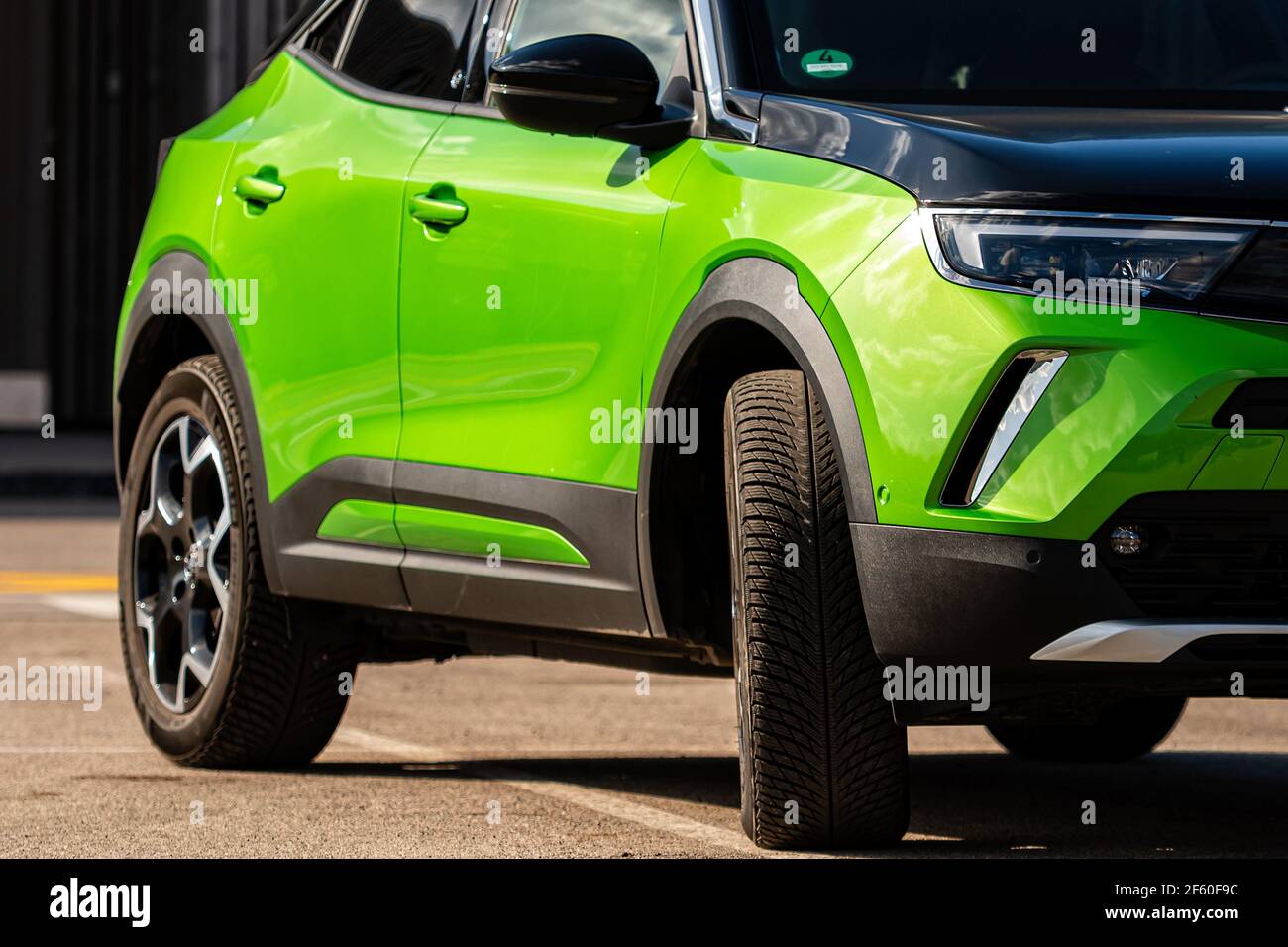 Riga, Latvia - 26 March, 2021: close-up of the green electric vehicle ...