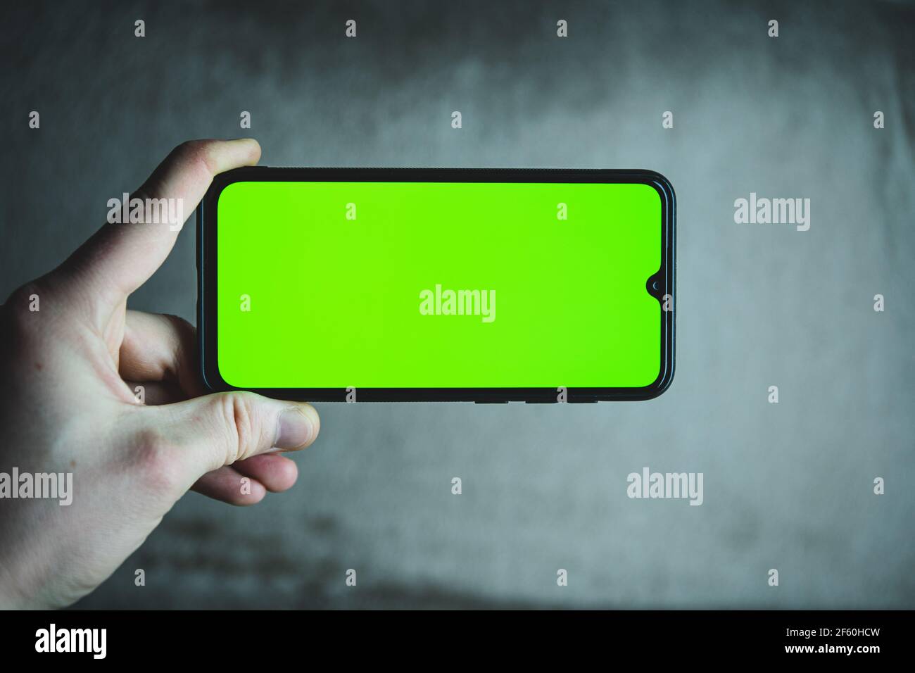 Smartphone with greenscreen. Mobile phone frameless design concept ...