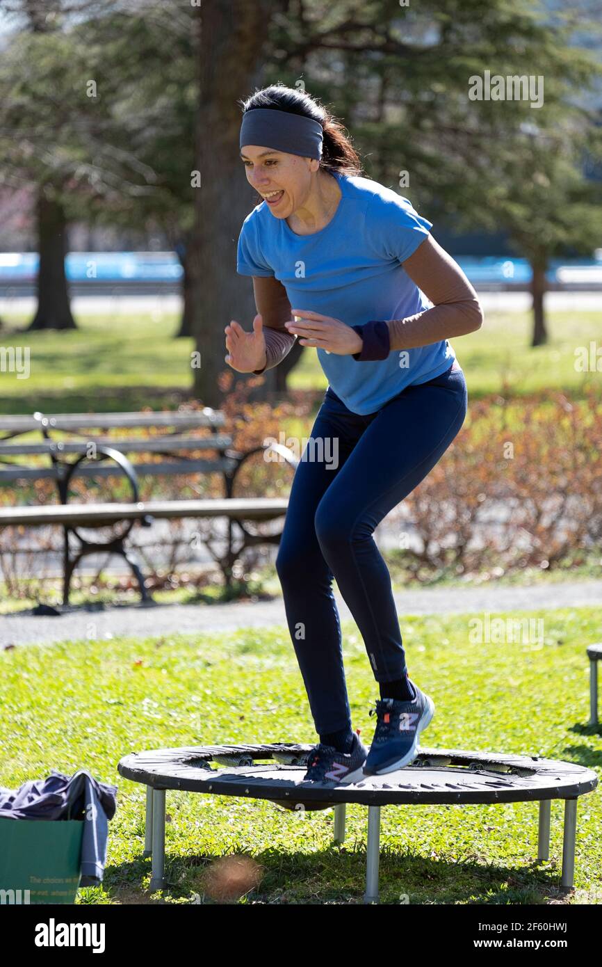 An attractive fit woman at an urban rebounding class in Queens, New ...