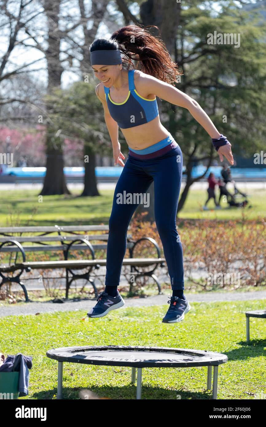 An attractive fit woman at an urban rebounding class in Queens, New ...