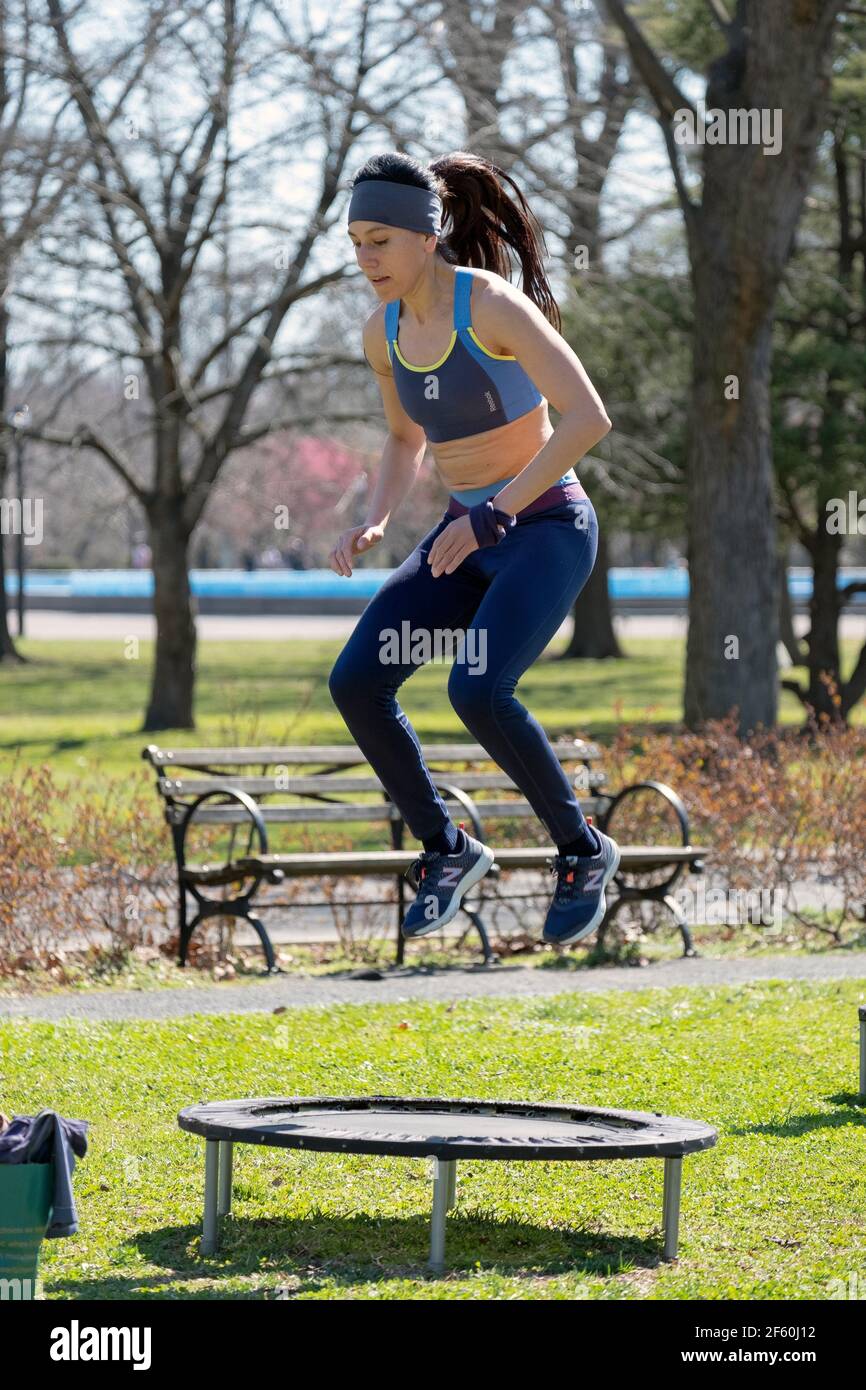 An attractive fit woman at an urban rebounding class in Queens, New ...