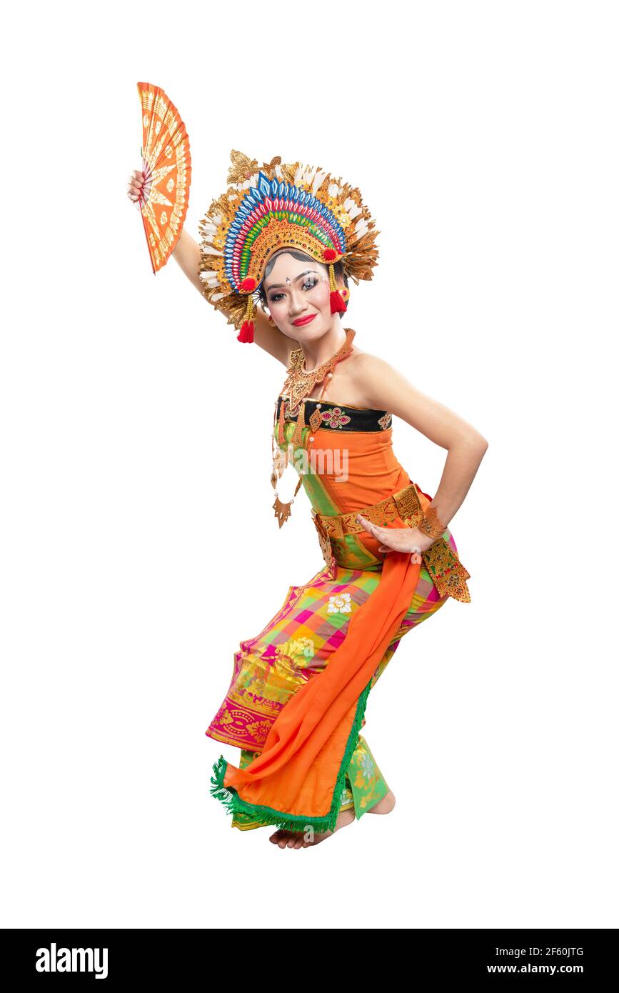 Asian woman dancing Balinese traditional dance isolated over white ...