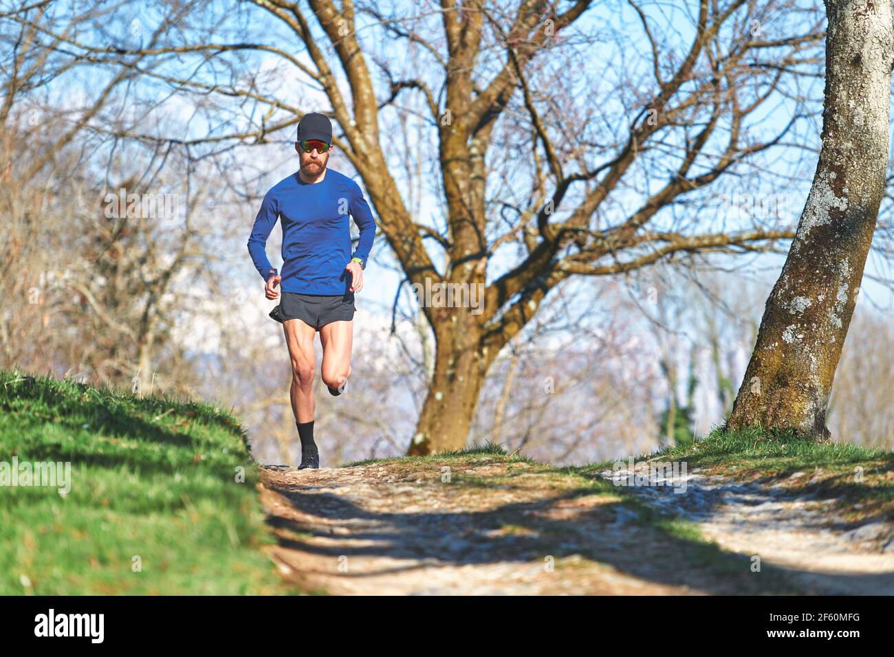Ultra marathon man athlete during a hill workout Stock Photo - Alamy