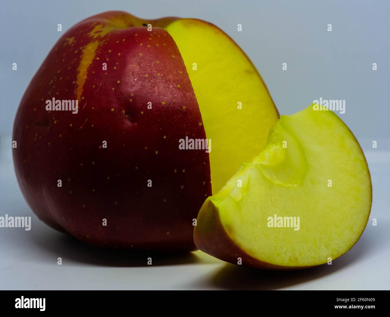 Set of fresh whole and cut apple and slices isolated on white ...