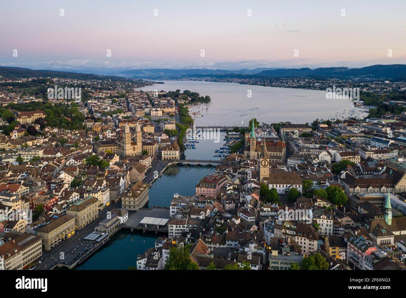 Aerial view of the twilight over Zurich old town where the Limmat river ...