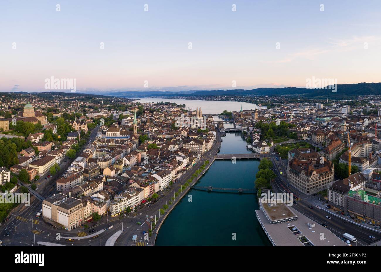 Aerial view of the sunset over Zurich old town and dwontown district ...