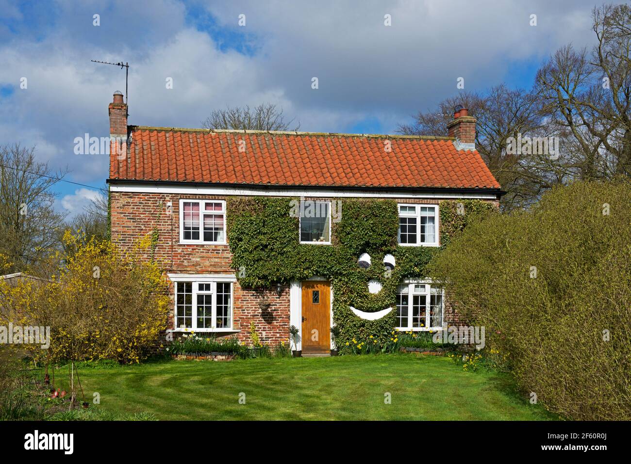 Happy house in the village of Hayton, East Yorkshire, England UK Stock ...