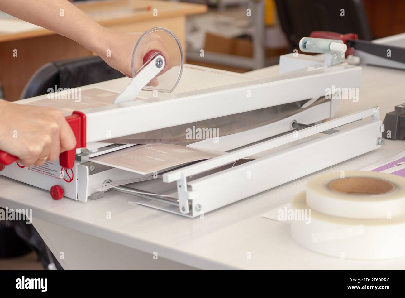 close-up metal sharp knife blade from manual guillotine for paper ...