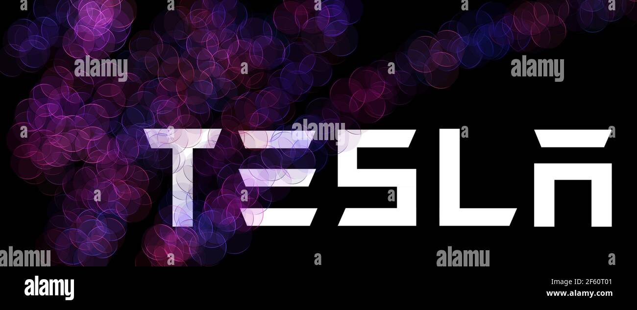 Illustration of wordings with the Tesla symbol Stock Photo - Alamy