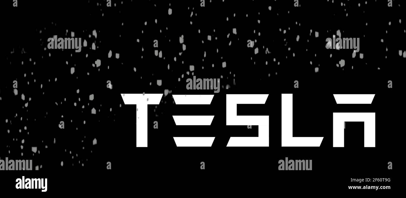 Illustration of wordings with the Tesla symbol Stock Photo - Alamy