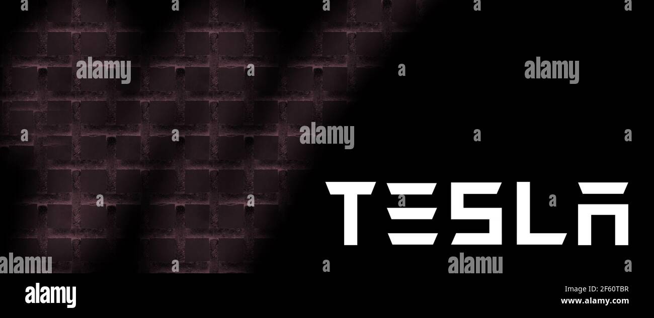 Illustration of wordings with the Tesla symbol Stock Photo - Alamy
