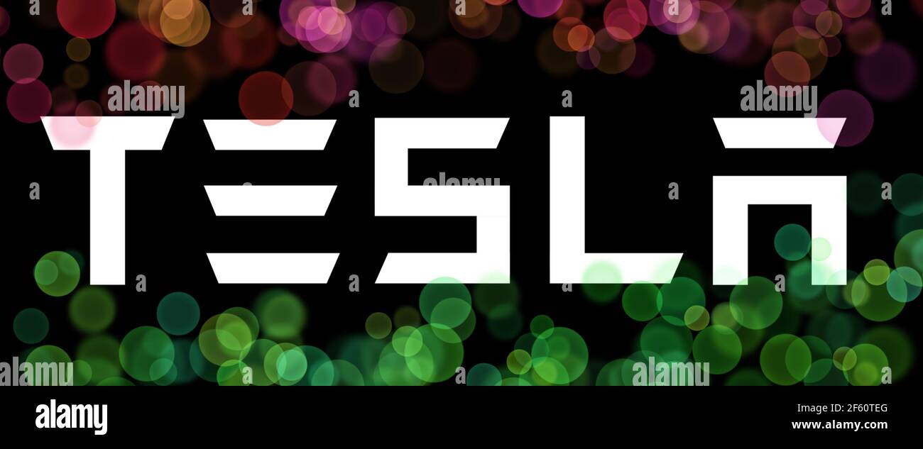 Illustration of wordings with the Tesla symbol Stock Photo - Alamy