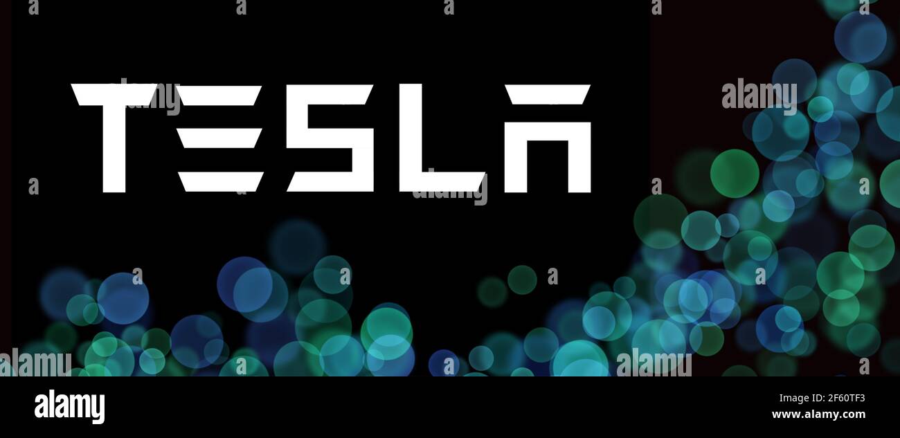 Illustration of wordings with the Tesla symbol Stock Photo - Alamy