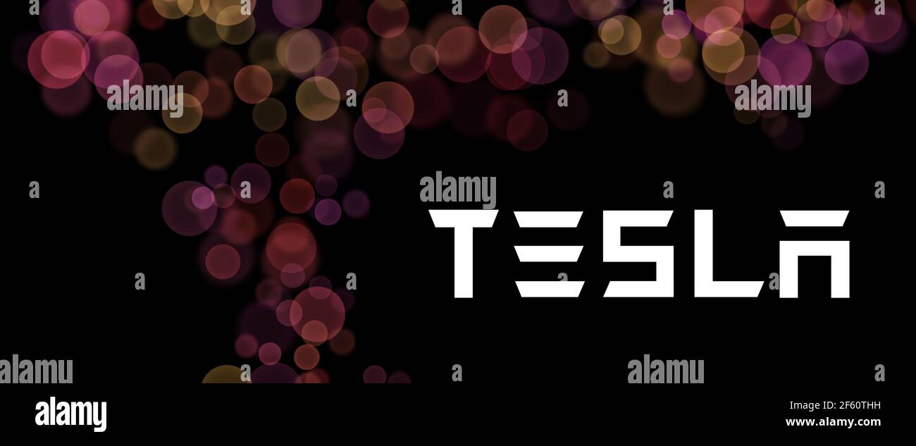 Illustration of wordings with the Tesla symbol Stock Photo - Alamy
