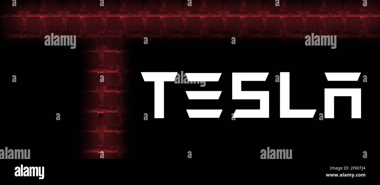 Illustration of wordings with the Tesla symbol Stock Photo - Alamy