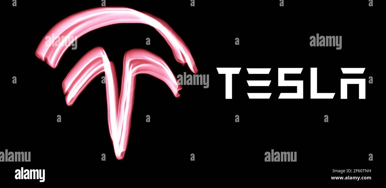 Illustration of wordings with the Tesla symbol Stock Photo - Alamy