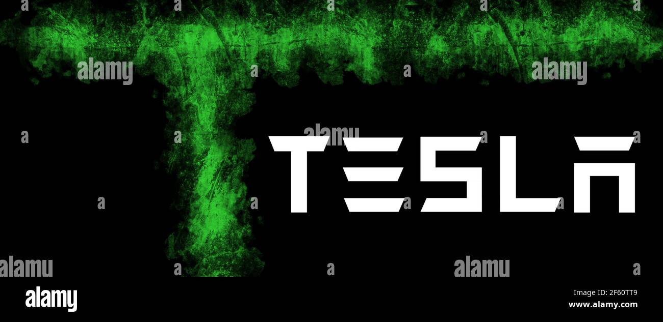 Illustration of wordings with the Tesla symbol Stock Photo - Alamy