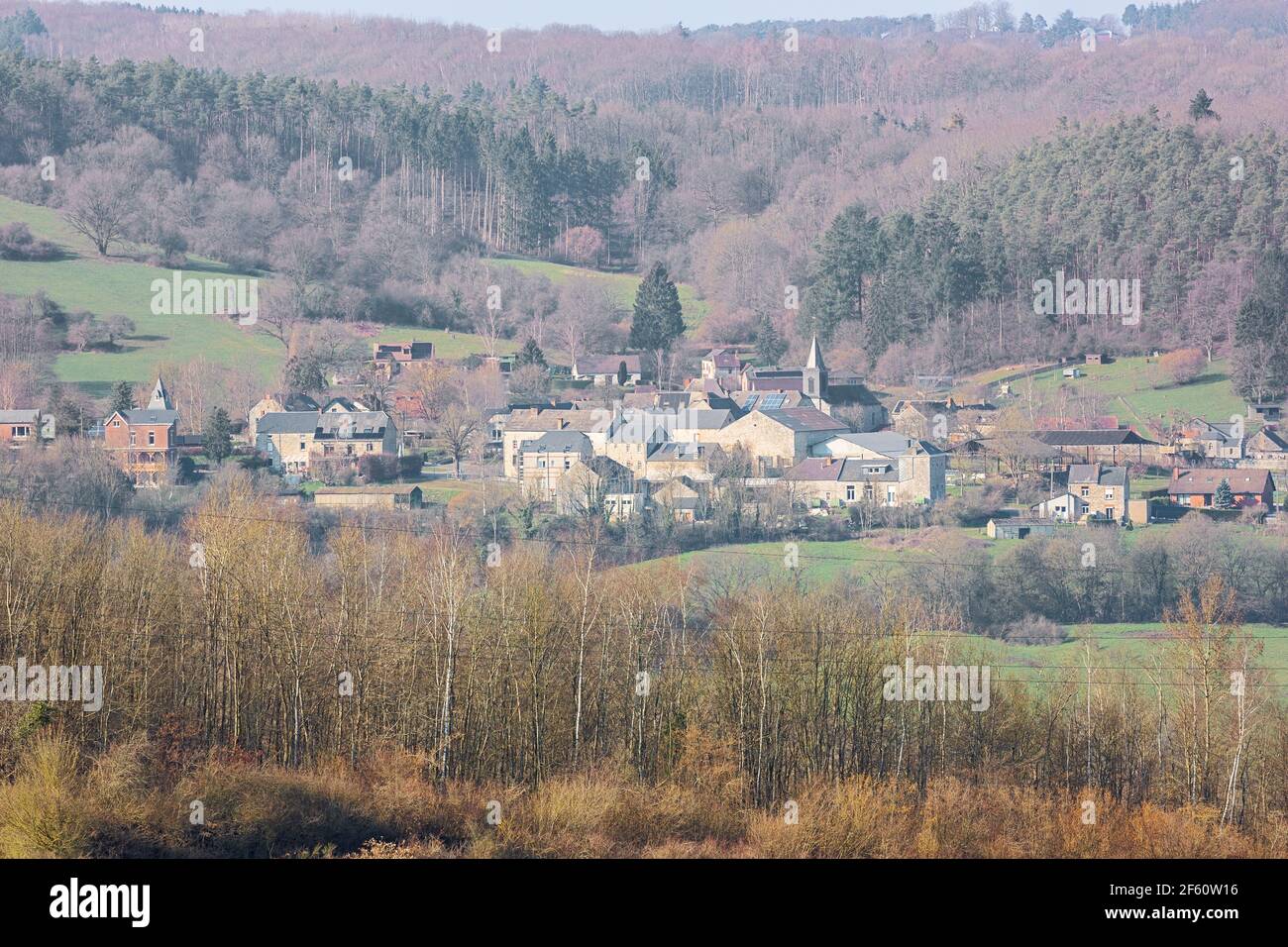 Warnant sitting against a hillside in the Condroz, near Namur Stock ...