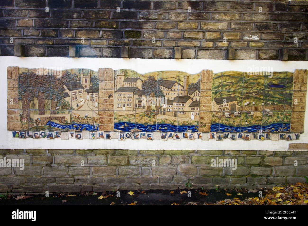 Welcome to the Holme Valley Riverside Way wall mosaic Stock Photo - Alamy
