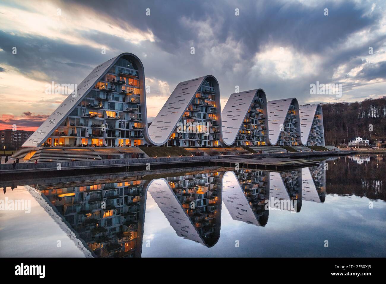The wave boelgen iconic modern apartments in Vejle, Denmark Stock Photo ...